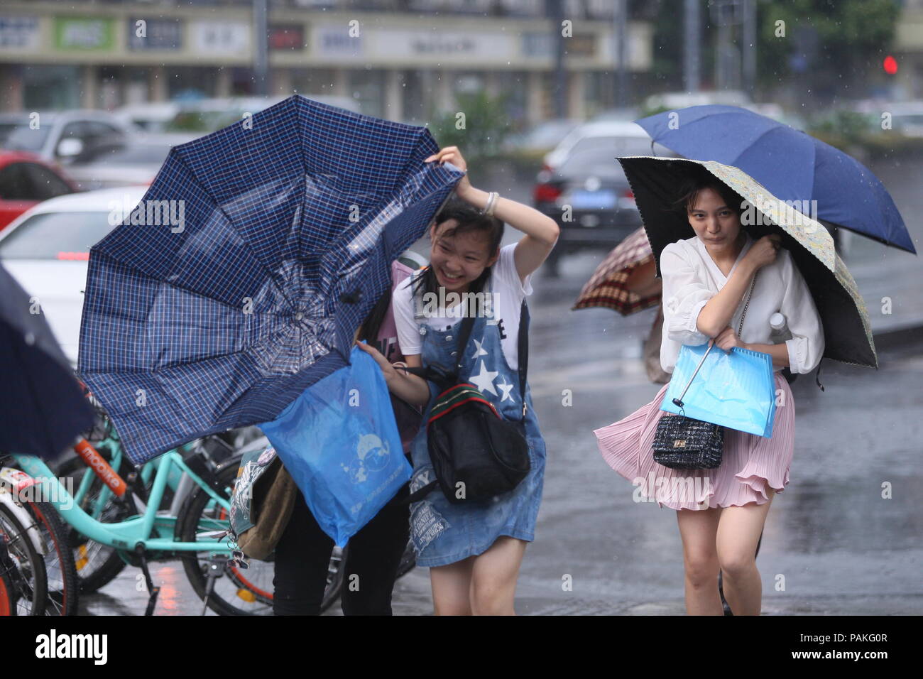 Chengdu,Sichuan,China,24th July,2018.Heavy rain has suddenly disrupted ...