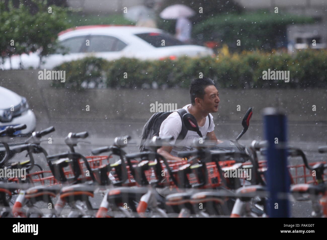 Chengdu,Sichuan,China,24th July,2018.Heavy rain has suddenly disrupted ...