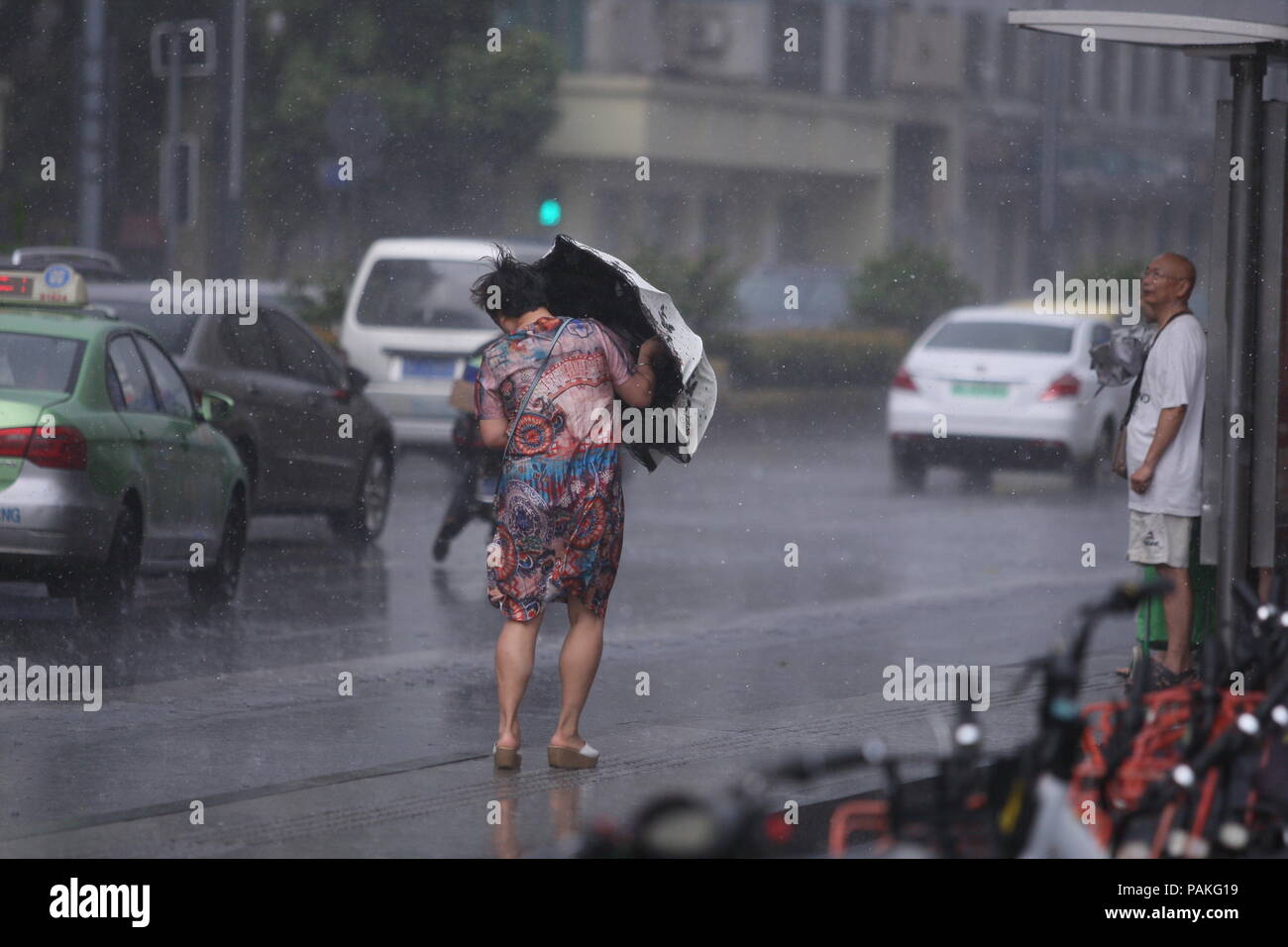 Chengdu,Sichuan,China,24th July,2018.Heavy rain has suddenly disrupted ...