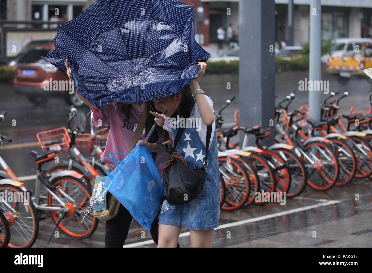 Chengdu,Sichuan,China,24th July,2018.Heavy rain has suddenly disrupted ...