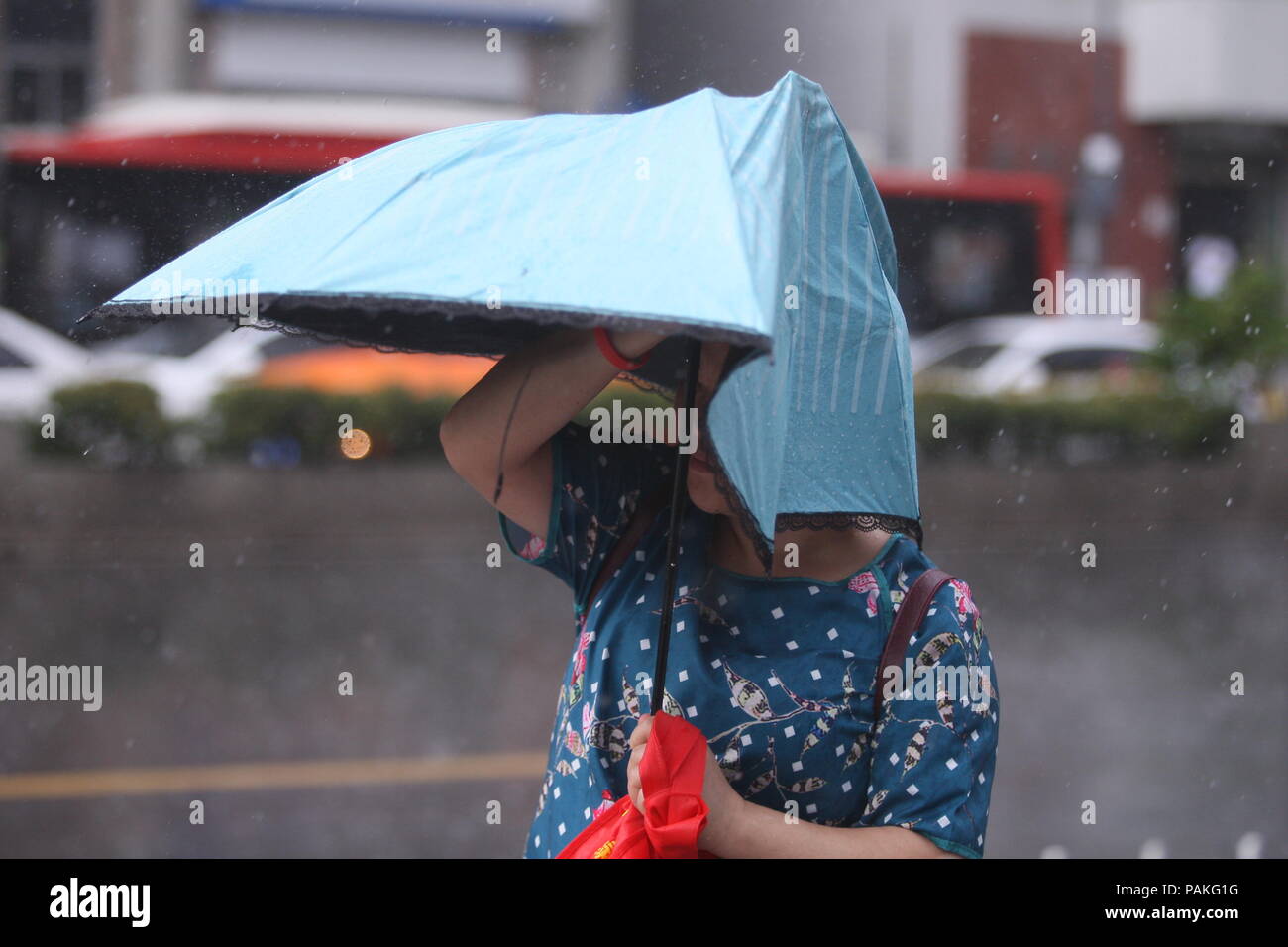 Chengdu,Sichuan,China,24th July,2018.Heavy rain has suddenly disrupted ...