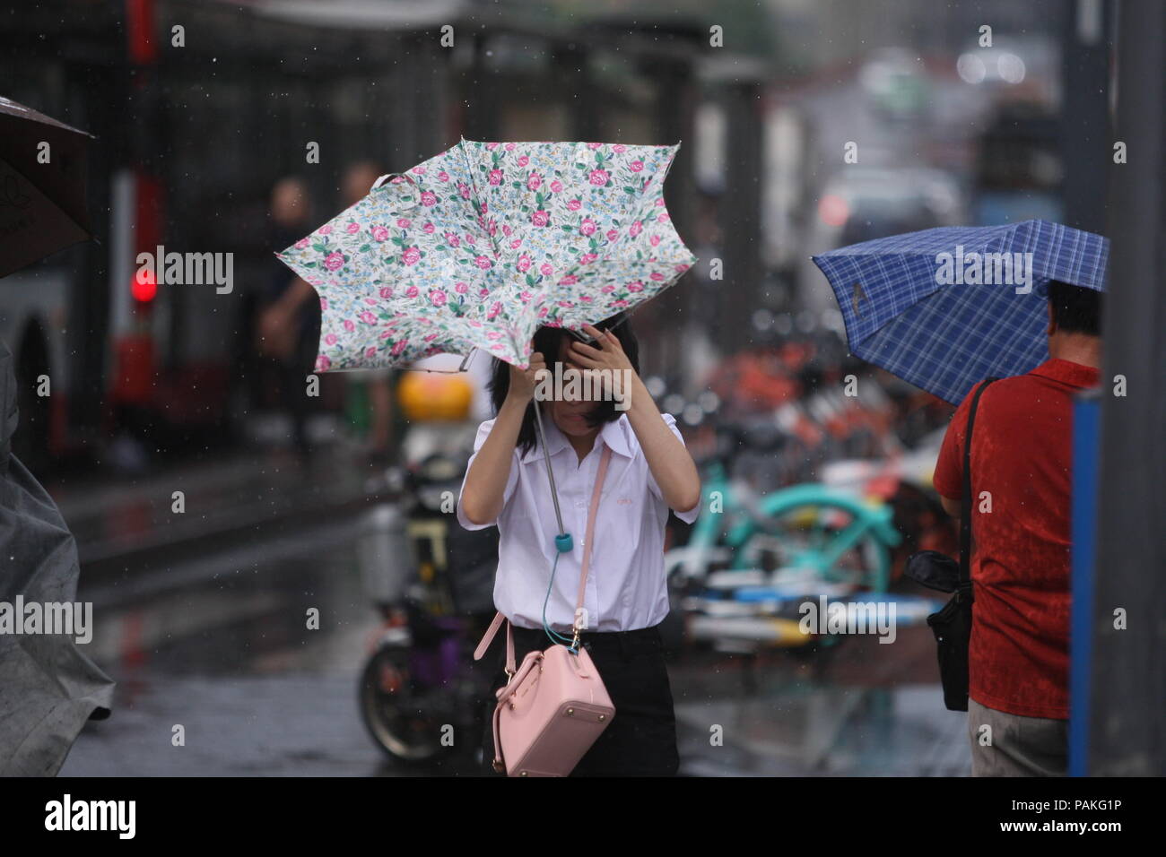 Chengdu,Sichuan,China,24th July,2018.Heavy rain has suddenly disrupted ...