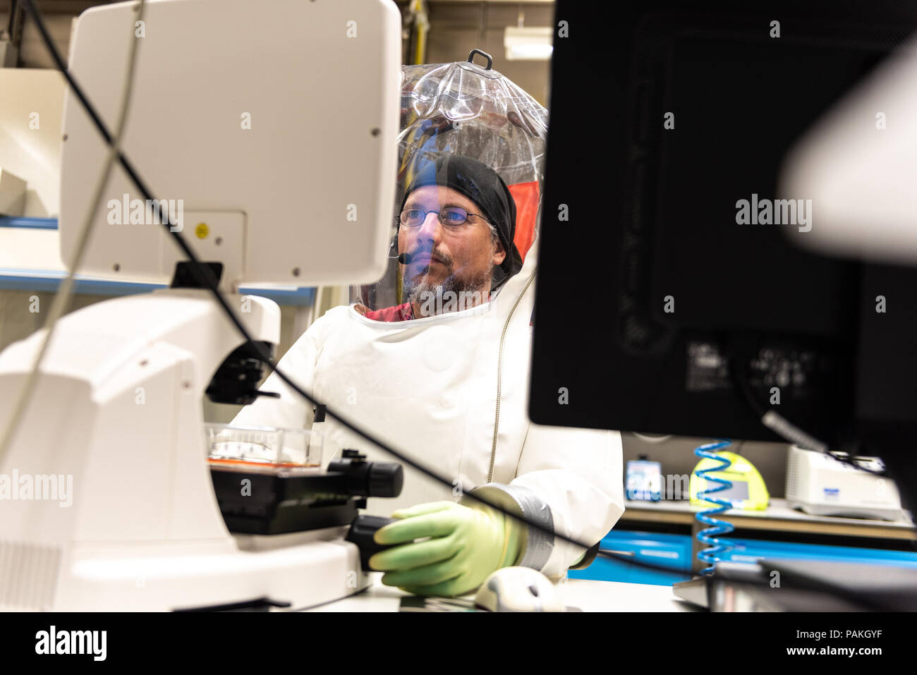 Berlin, Germany. 24th July, 2018. A laboratory technician work during a ...