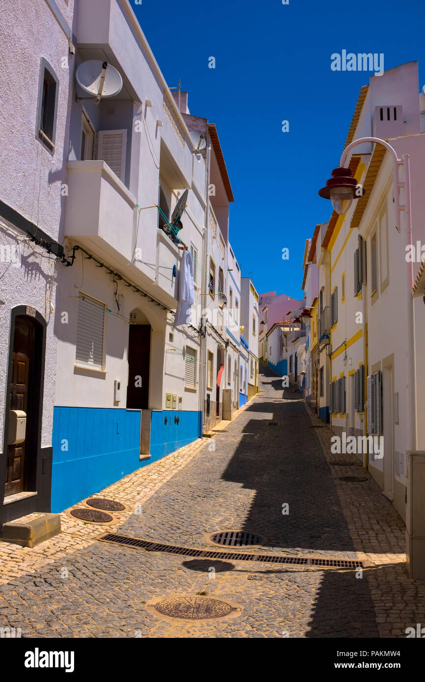 The fishing and holiday village of Salema, Algarve, Portugal Stock ...