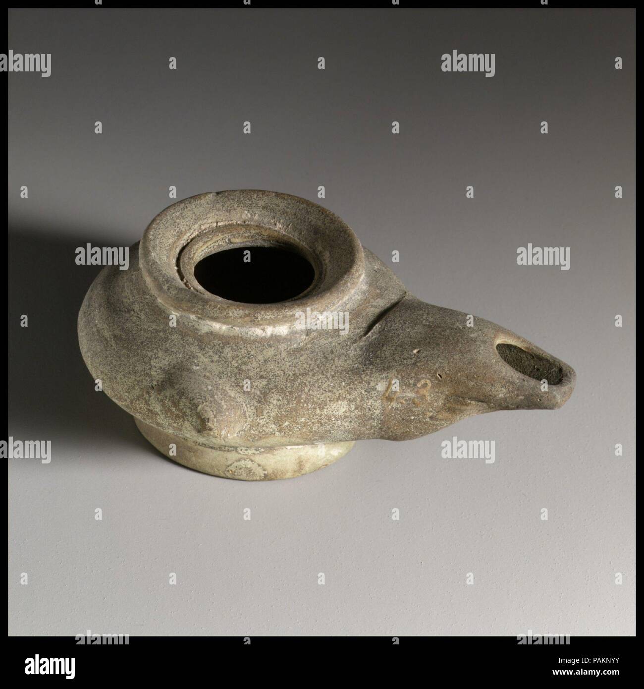 Lamp. Culture: Greek or Roman. Dimensions: Overall: 1 3/8 x 3 5/8 in ...