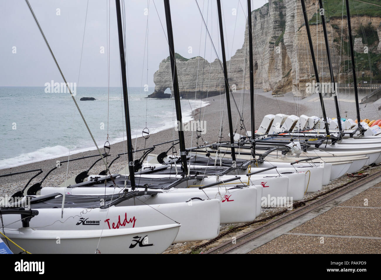 Sailing dinghies on the beach at Etretat on the English Channel ...