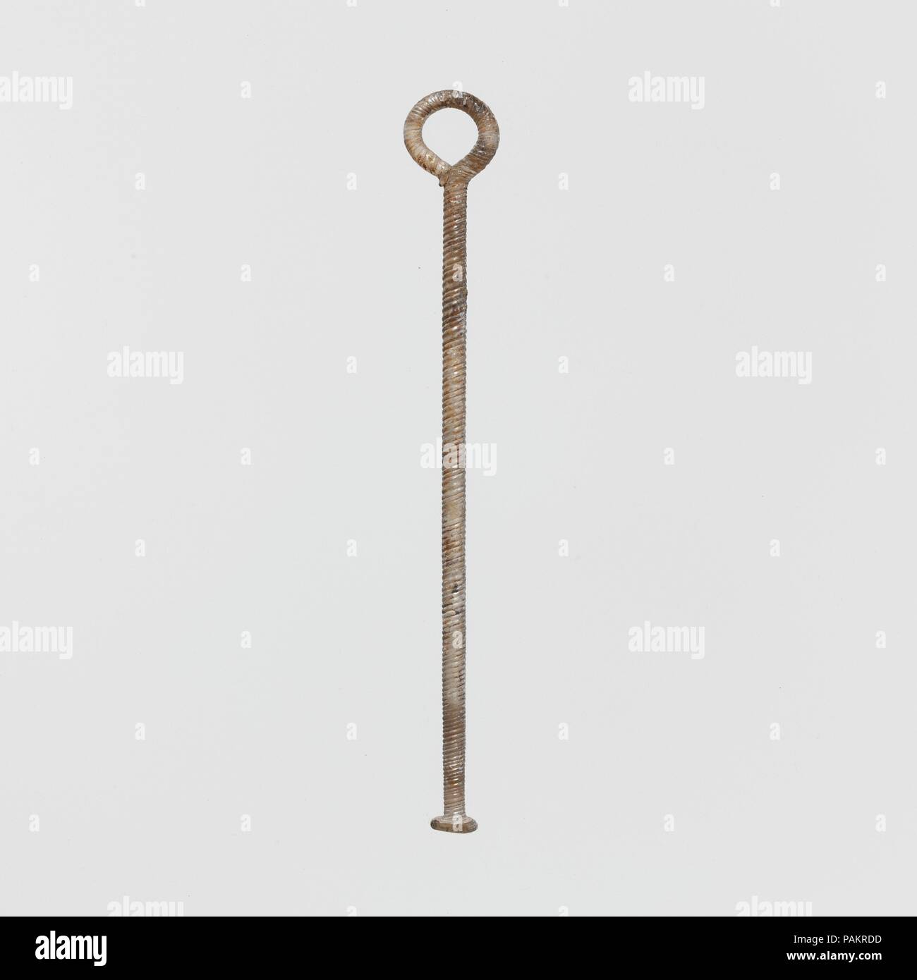 Glass stirring rod. Culture: Roman. Dimensions: H. 7 5/8 in. (19.4 cm ...