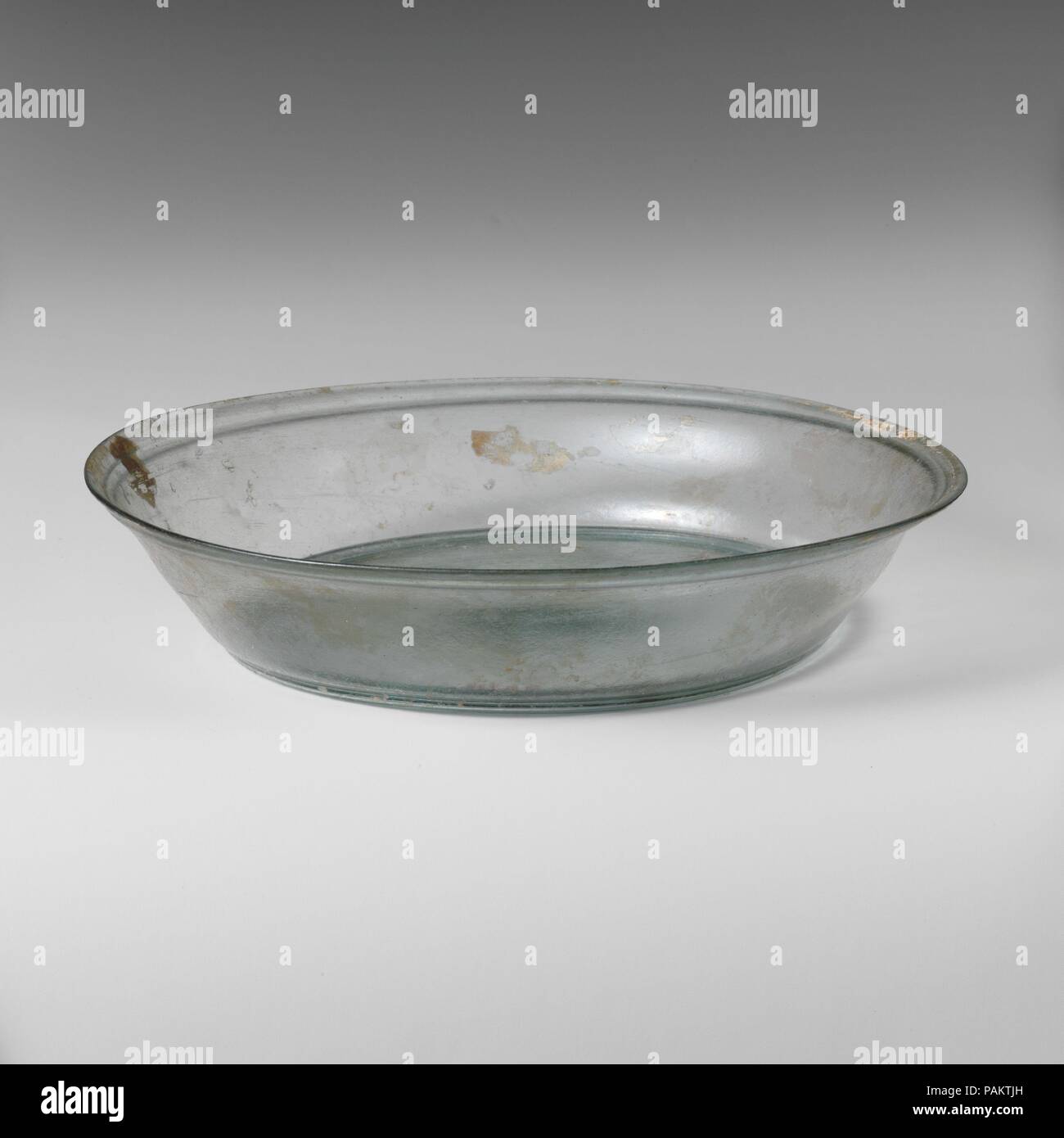 Glass dish. Culture: Roman, Cypriot. Dimensions: 1 3/4 x 8 3/16in. (4.5 ...