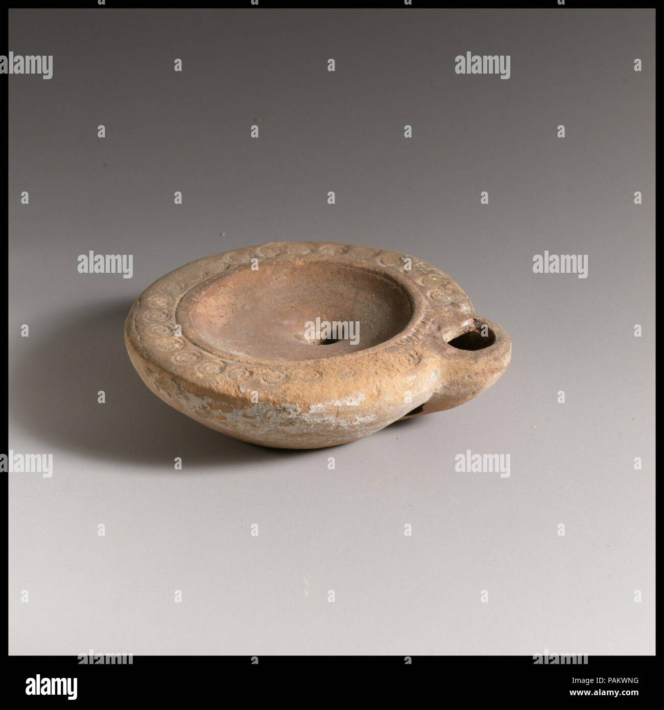 Lamp. Culture: Roman. Dimensions: Length: 2 15/16 in. (7.5 cm) Height ...