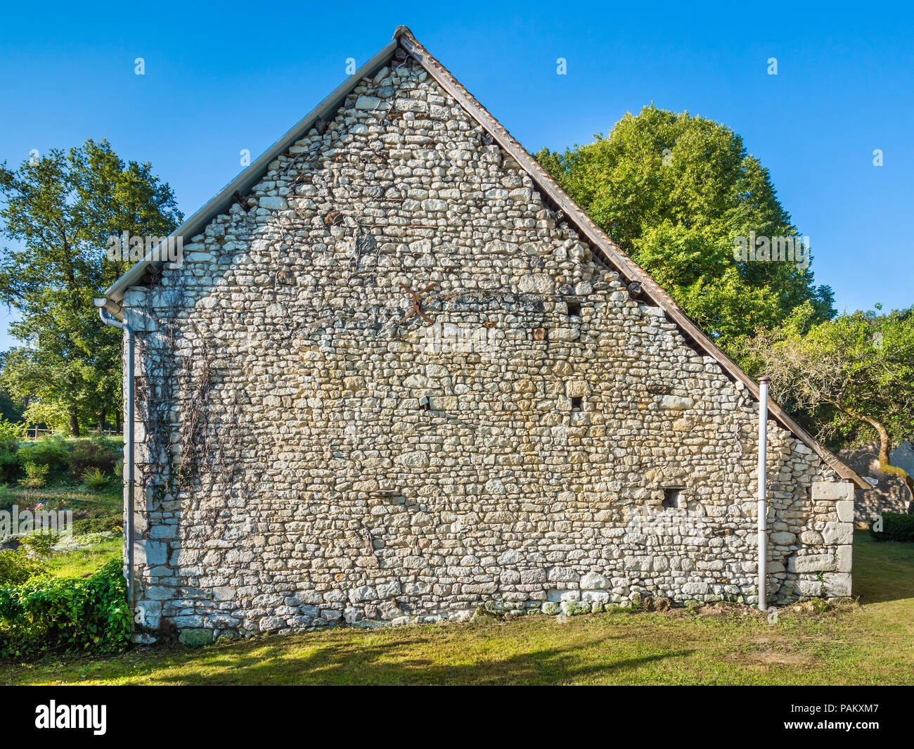 Textured wall of old stone barn, France Stock Photo - Alamy