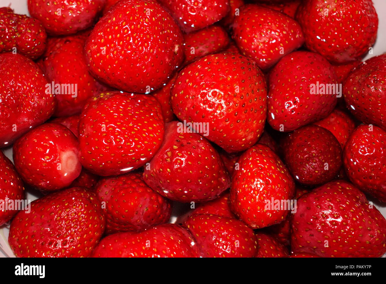 Red strawberries wallpaper Stock Photo - Alamy