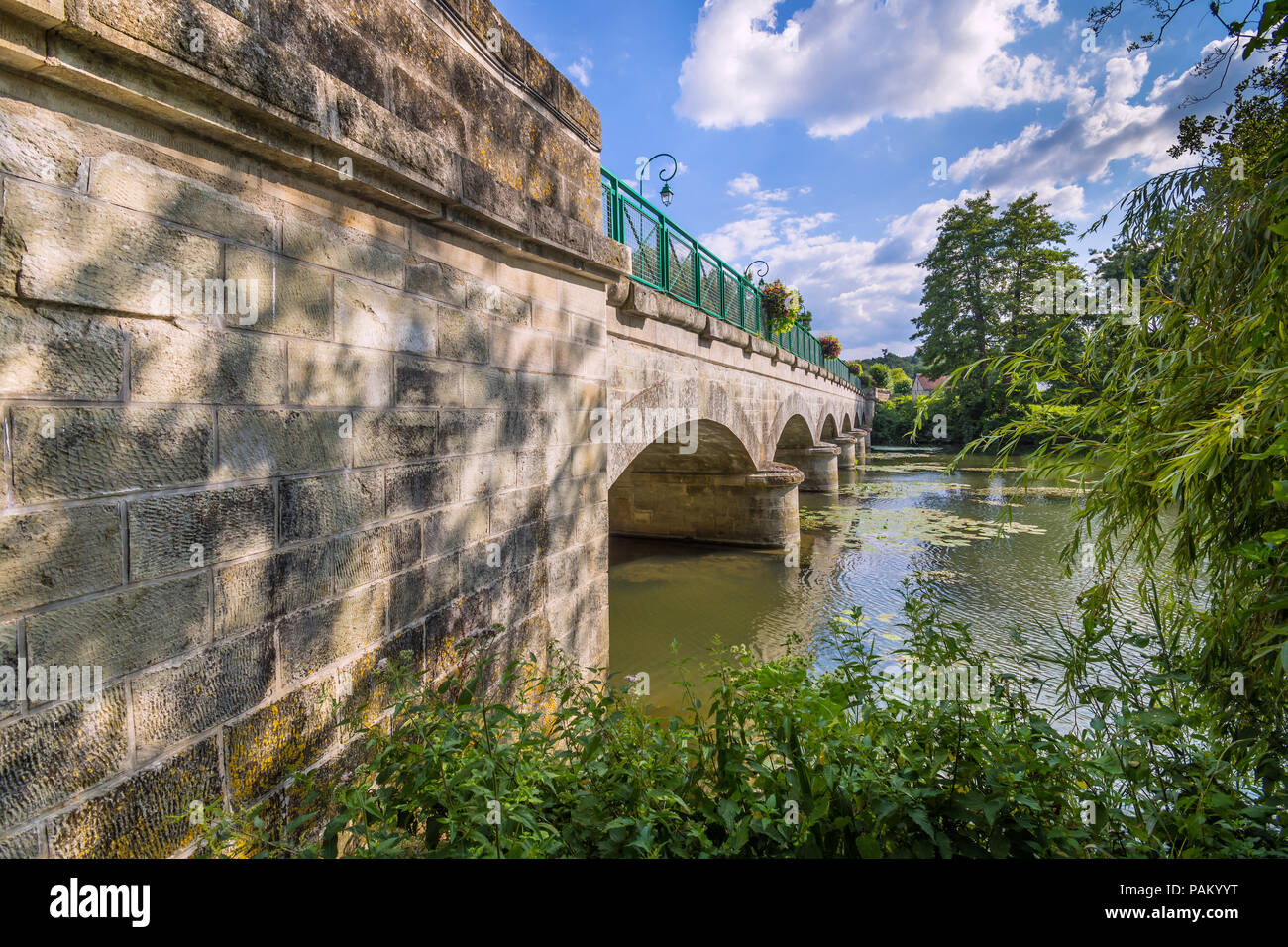 Stone arched road bridge across river Claise, Abilly, Indre-et-Loire ...
