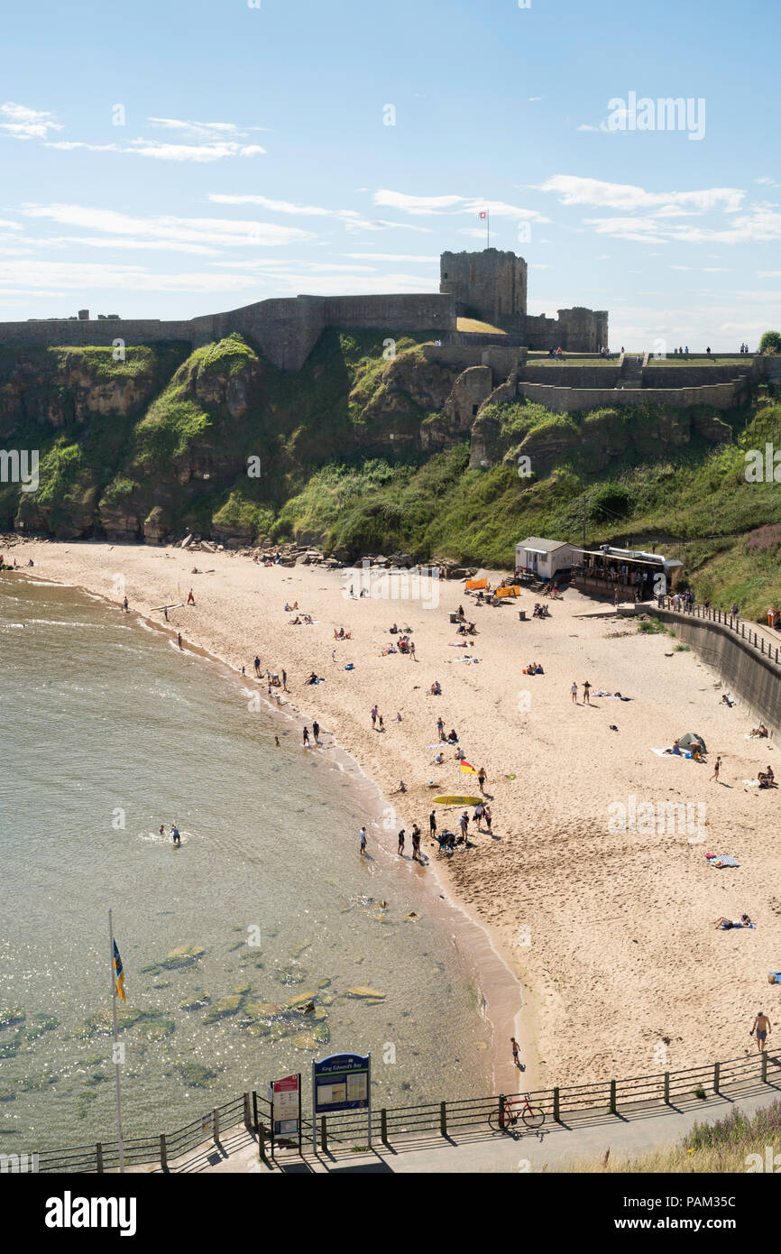 People enjoying sunshine on the beach at King Edwards Bay, Tynemouth ...