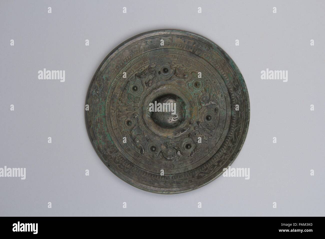 Mirror. Culture: China. Dimensions: Diam. 6 7/8 in. (17.5 cm). Museum ...