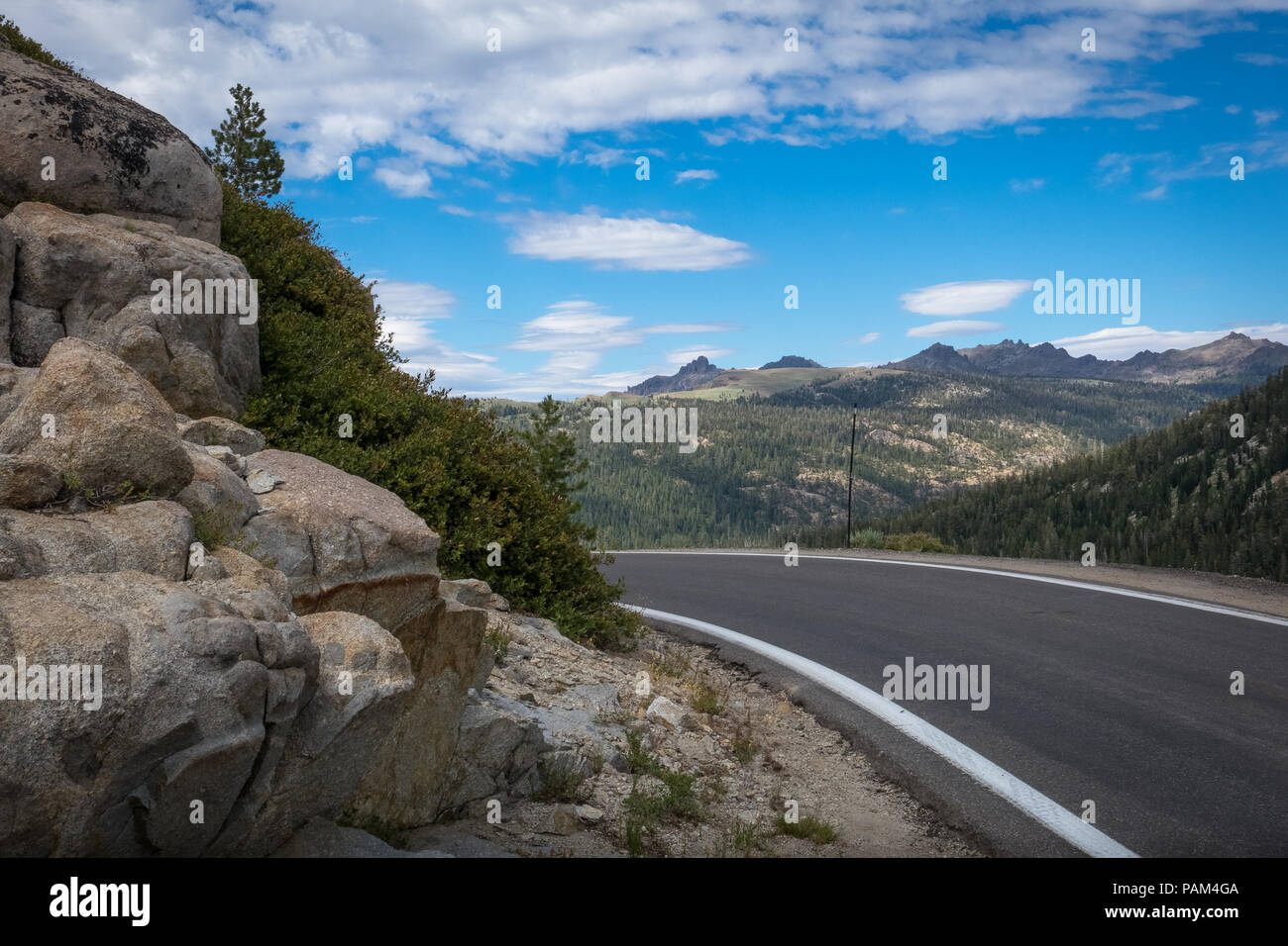 View of boulders and high mountain range at the Pacific Grade Summit ...