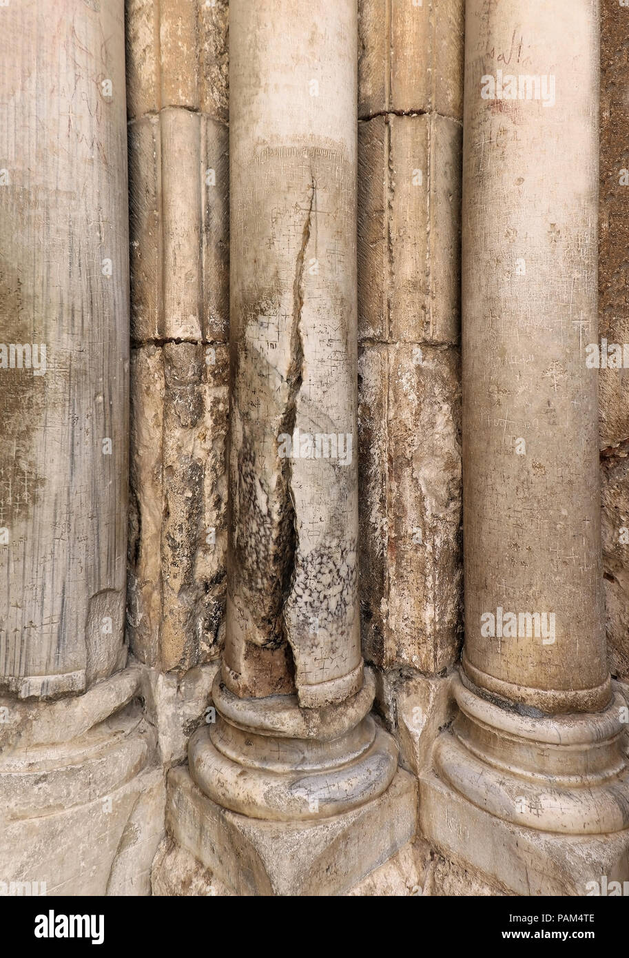 Ancient marble stone damaged columns with cracks and scratches Stock ...