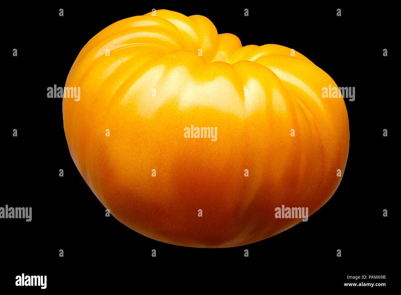 One whole big yellow tomato hi-res stock photography and images - Alamy