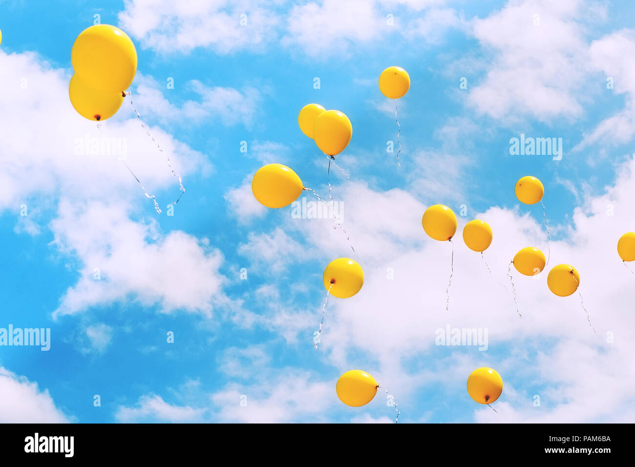 Sky balloons children flying hi-res stock photography and images - Alamy