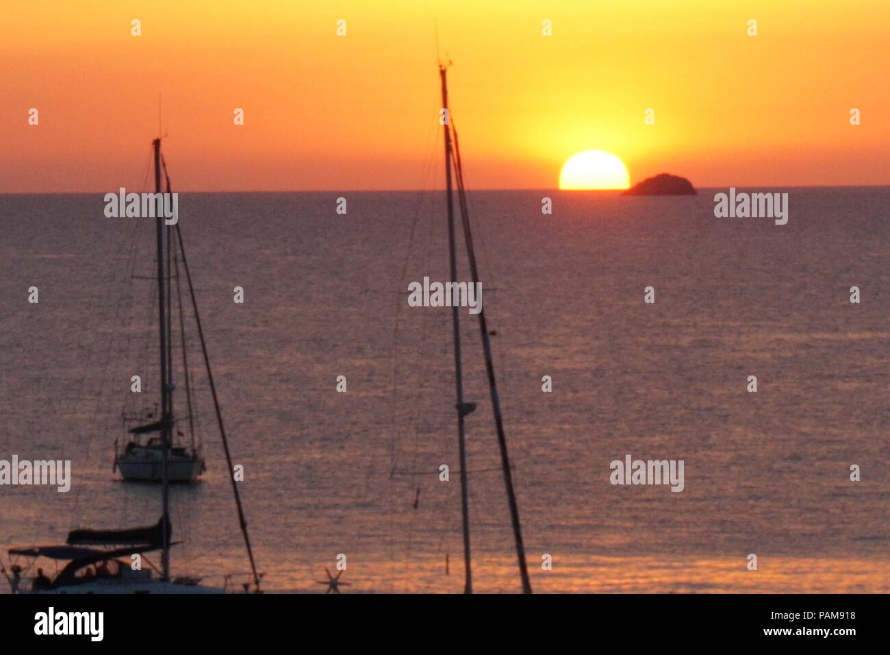 Sunset in Ibiza at Sunset Ashram bar Cala Conta Stock Photo - Alamy