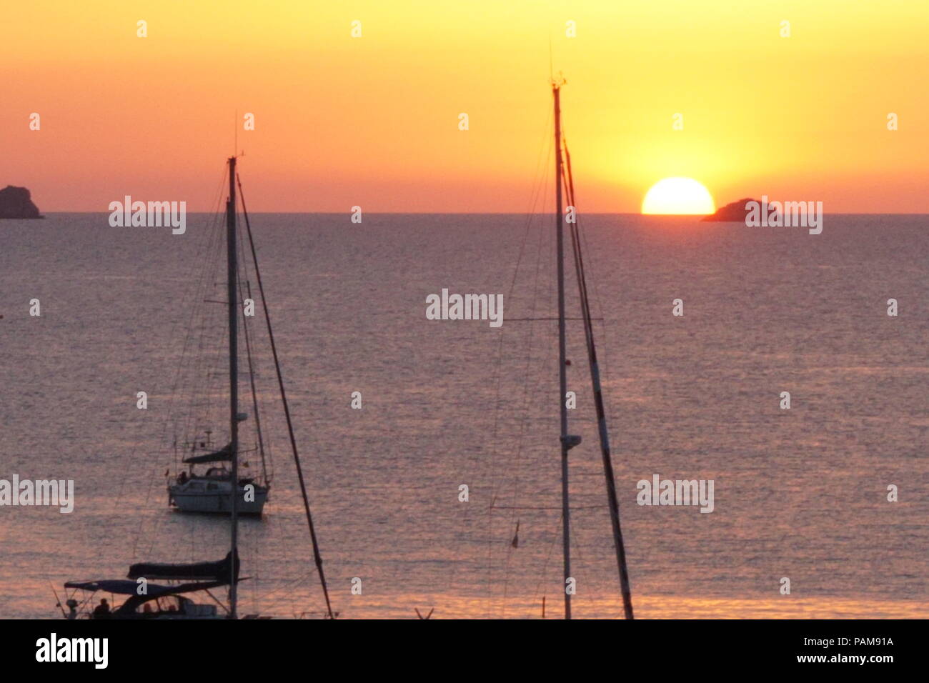 Sunset in Ibiza at Sunset Ashram bar Cala Conta Stock Photo - Alamy