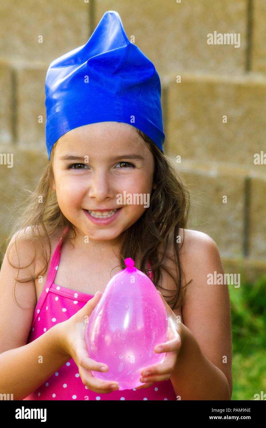 Girl Mischievous Smile High Resolution Stock Photography and Images - Alamy