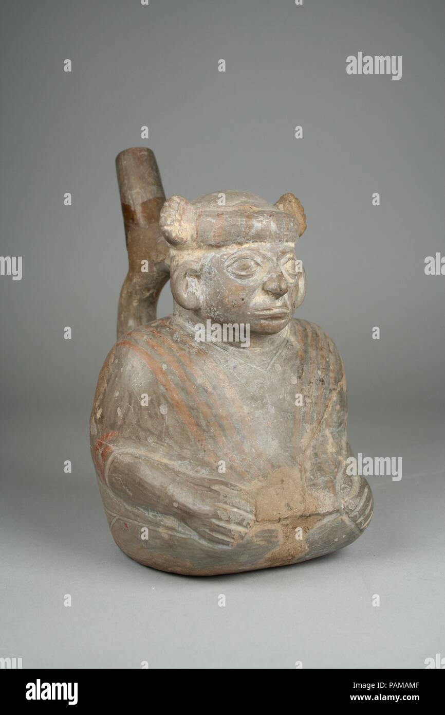 Stirrup Spout Bottle with Seated Figure. Culture: Moche. Dimensions: H ...