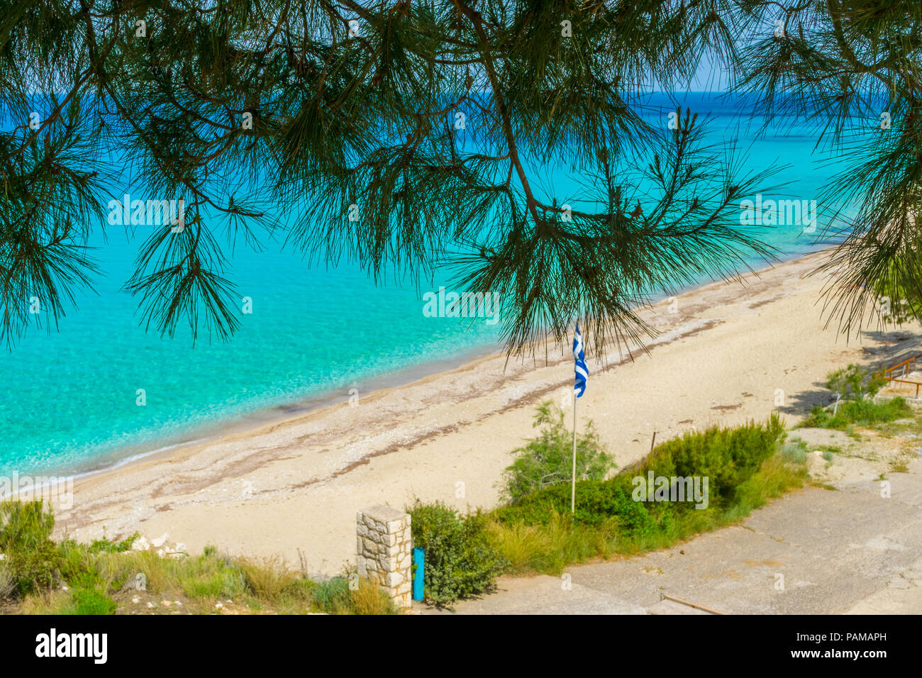 Aerial top view of Makris Gialos beach with crystal clear turquoise sea ...