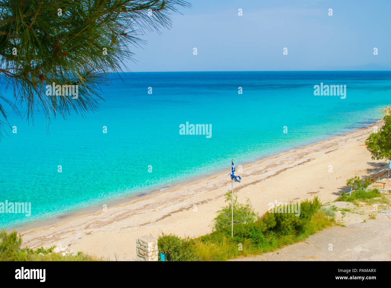 Aerial top view of Makris Gialos beach with crystal clear turquoise sea ...