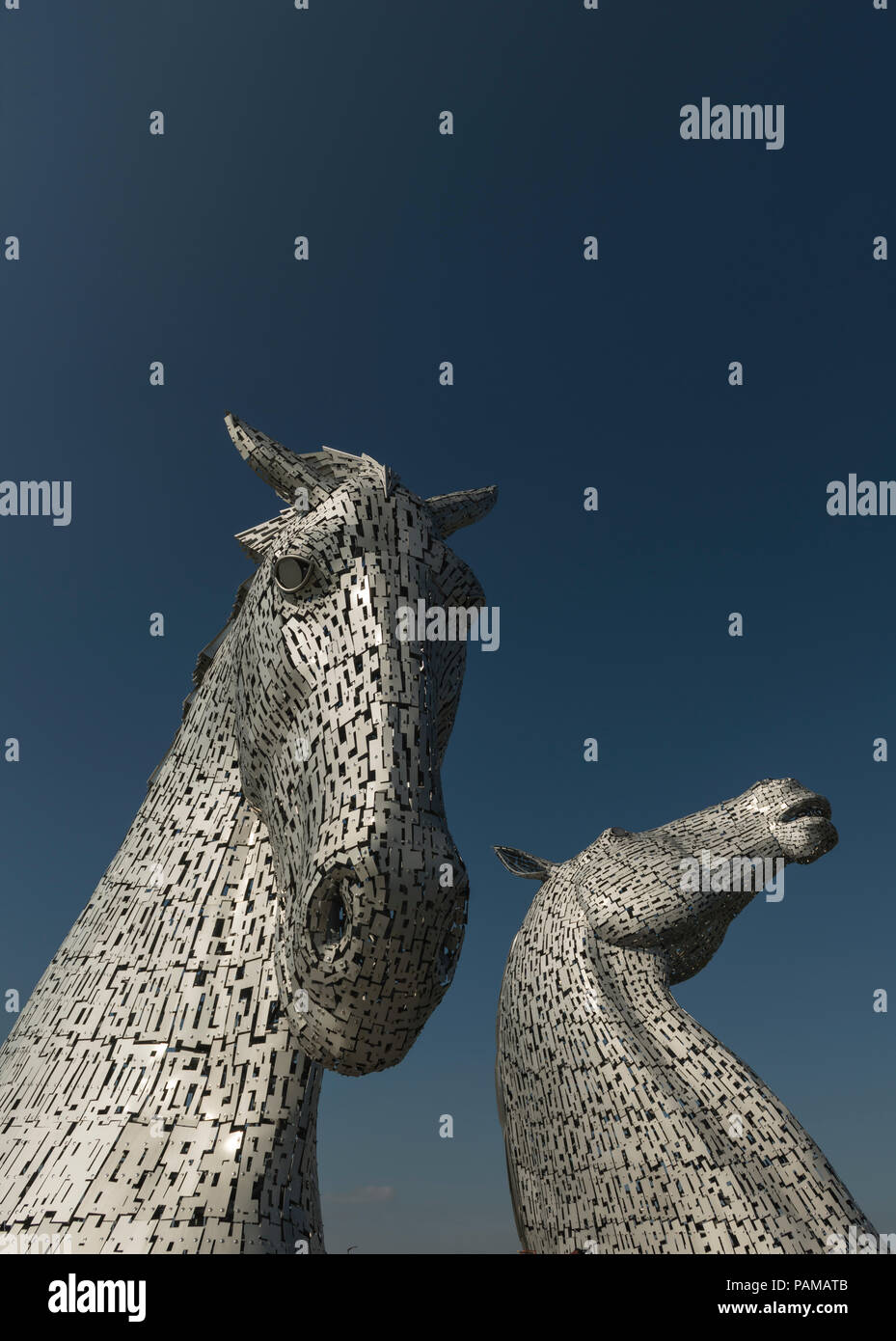 The iconic Kelpies sculpture by Andy Scott forms a gateway to the Forth ...