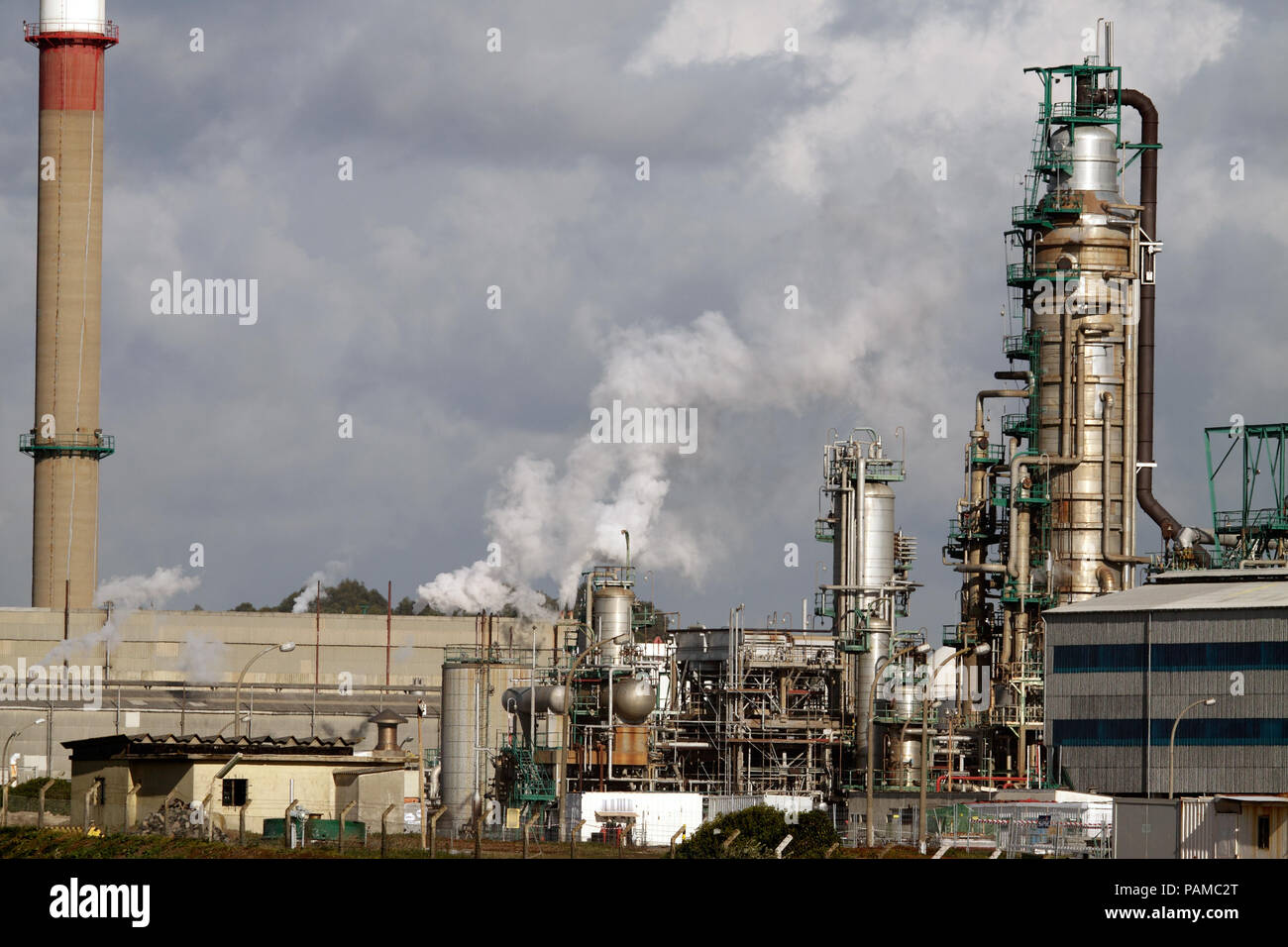 Part of a big oil refinery seeing steam Stock Photo - Alamy