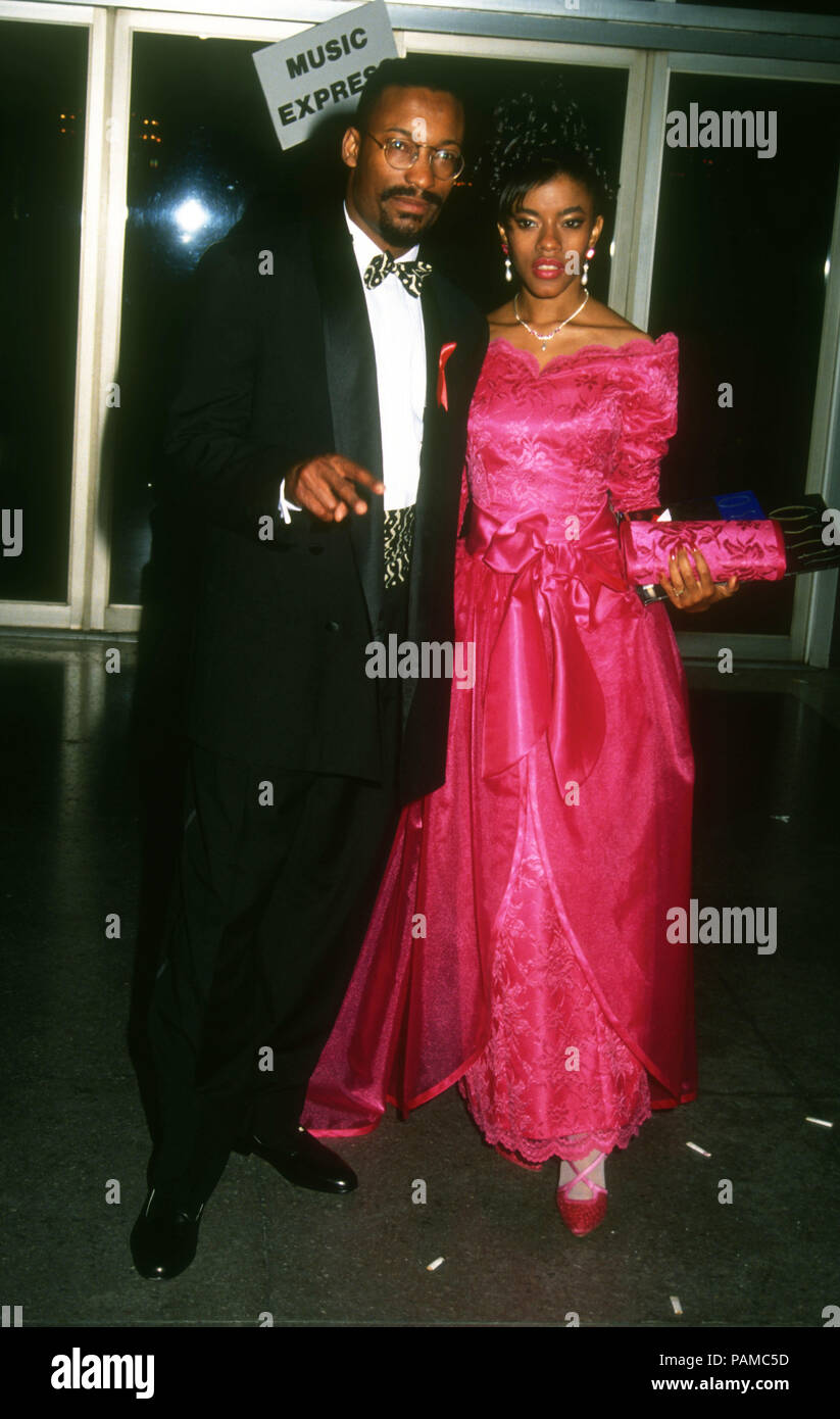 LOS ANGELES, CA - MARCH 30: Director John Singleton and Tasha Lewis ...