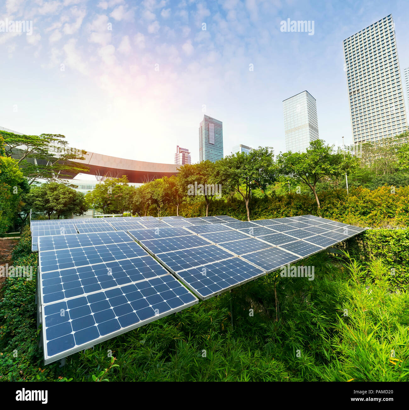 Ecological energy renewable solar panel plant with urban landscape ...