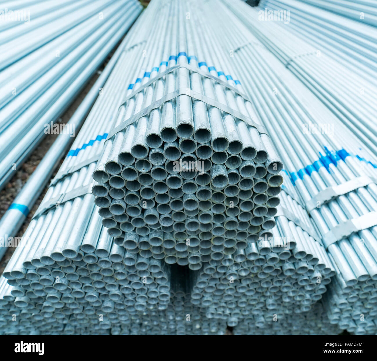 Steel Pipes Industry Construction stacked in Factory warehouse Stock ...