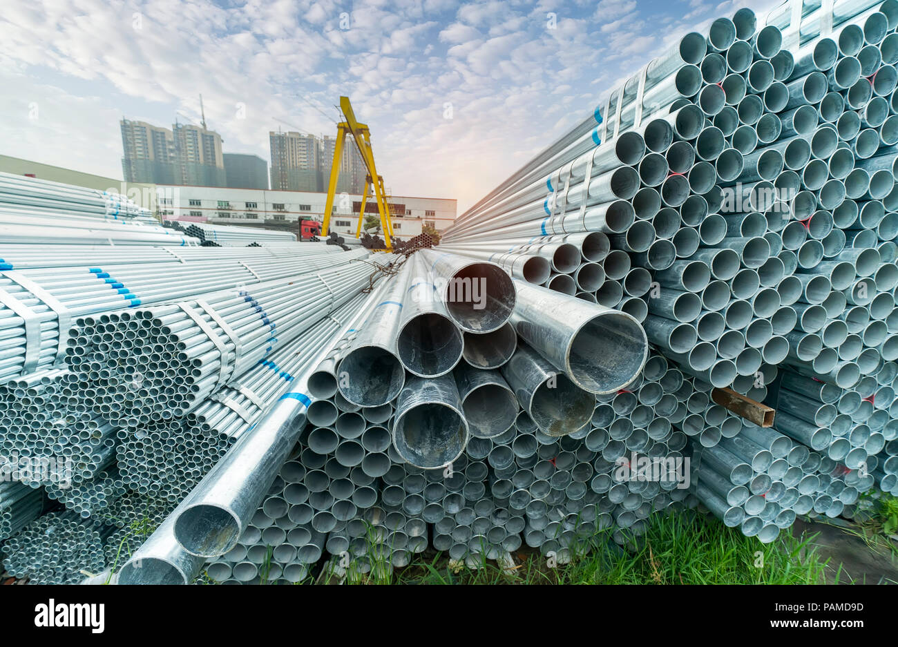 Steel Pipes Industry Construction stacked in Factory warehouse Stock ...