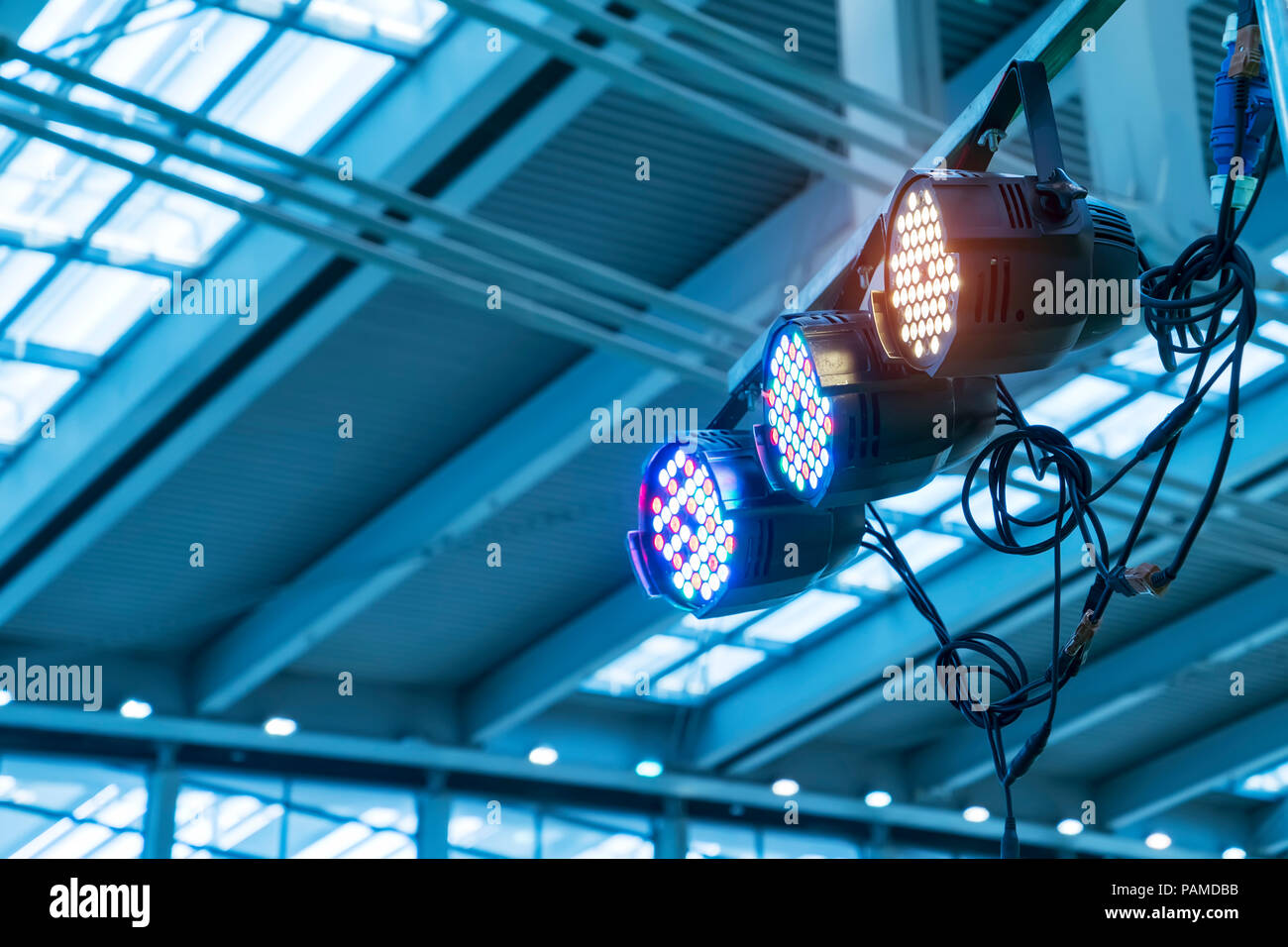 spotlights on a theatre stage lighting rig for consert Stock Photo - Alamy