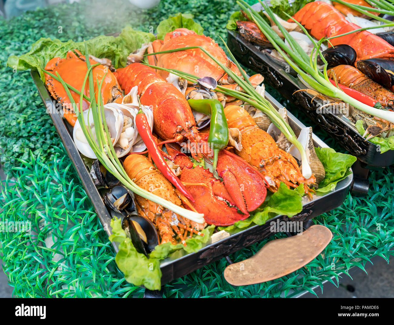 Shellfish plate of crustacean seafood with fresh lobster as an ocean ...