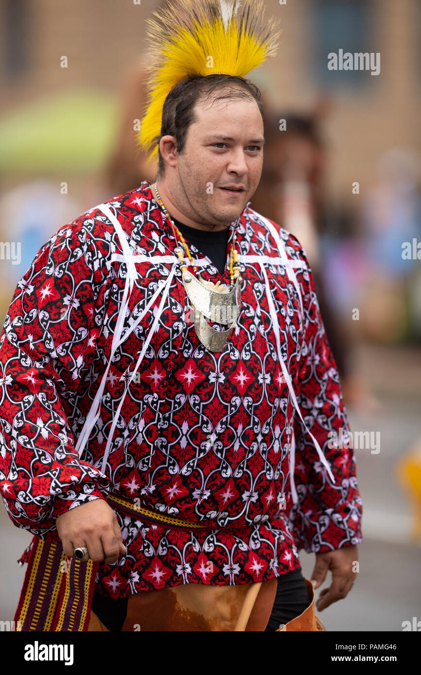 Peru, Indiana, USA - July 21, 2018 Man wearing a native american outfit ...