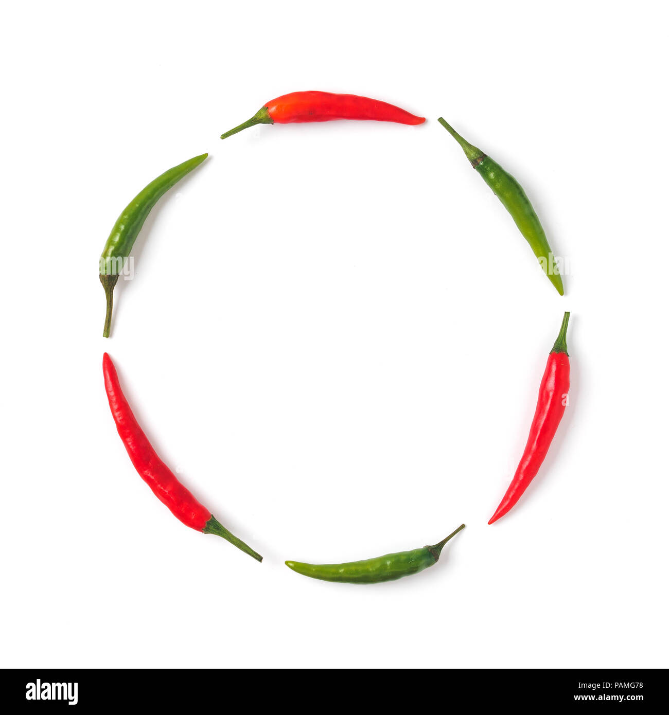Creative layout chilli peppers. Circle form made from green and red hot ...