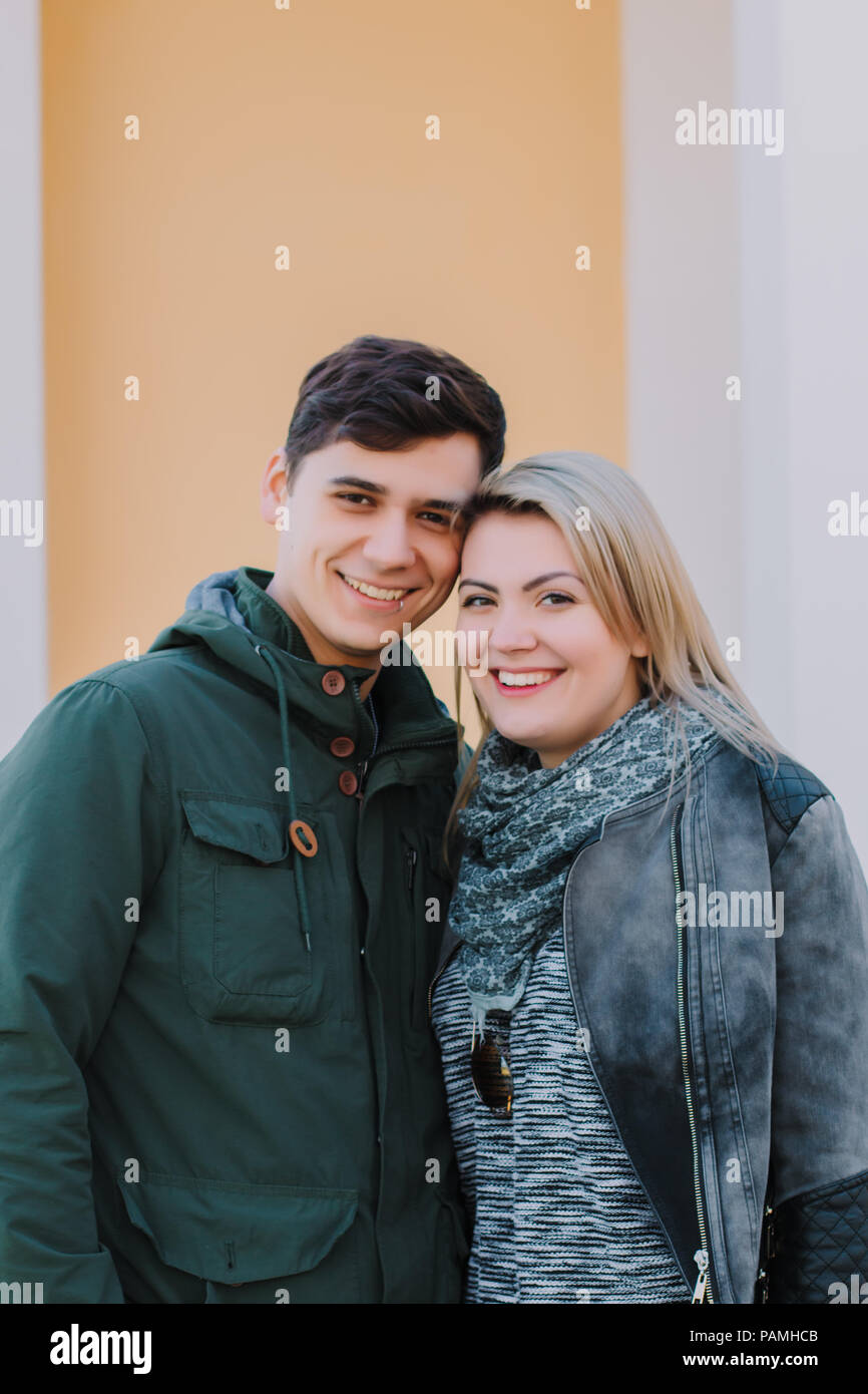 Beautiful loving each other couple smiling and kissing Stock Photo - Alamy