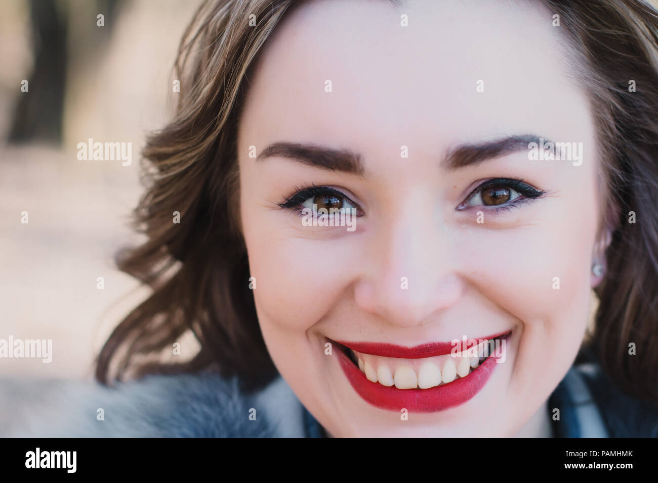 Portrait of a happy enamored girl in anticipation of a beloved man in ...