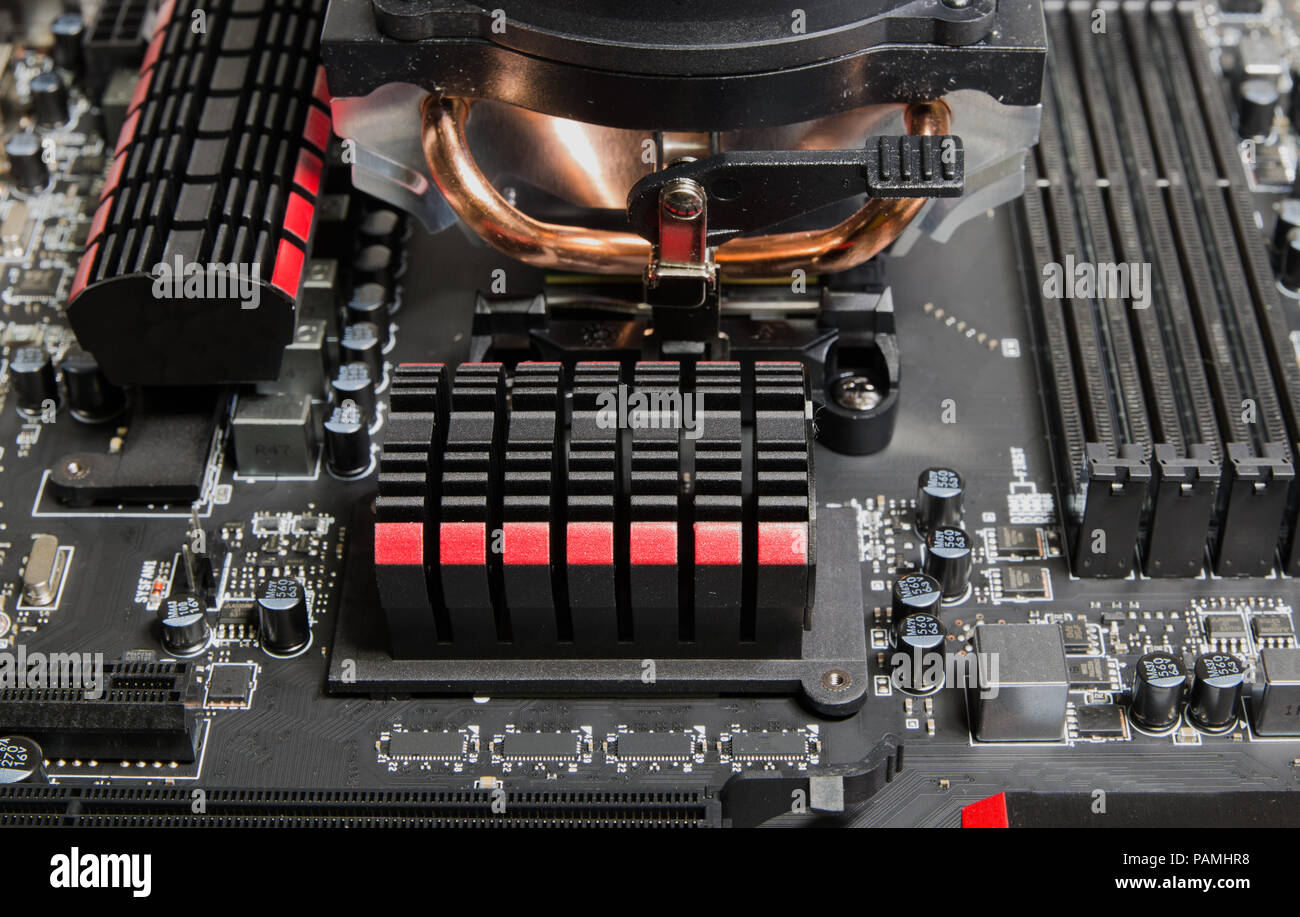 Installing the cooler on the motherboard Stock Photo - Alamy