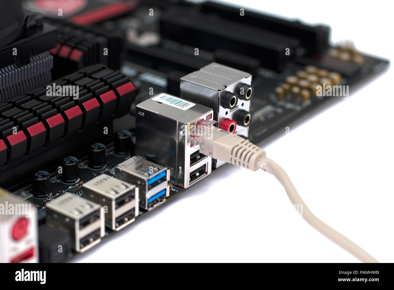 A motherboard with a network cable connected to it Stock Photo - Alamy