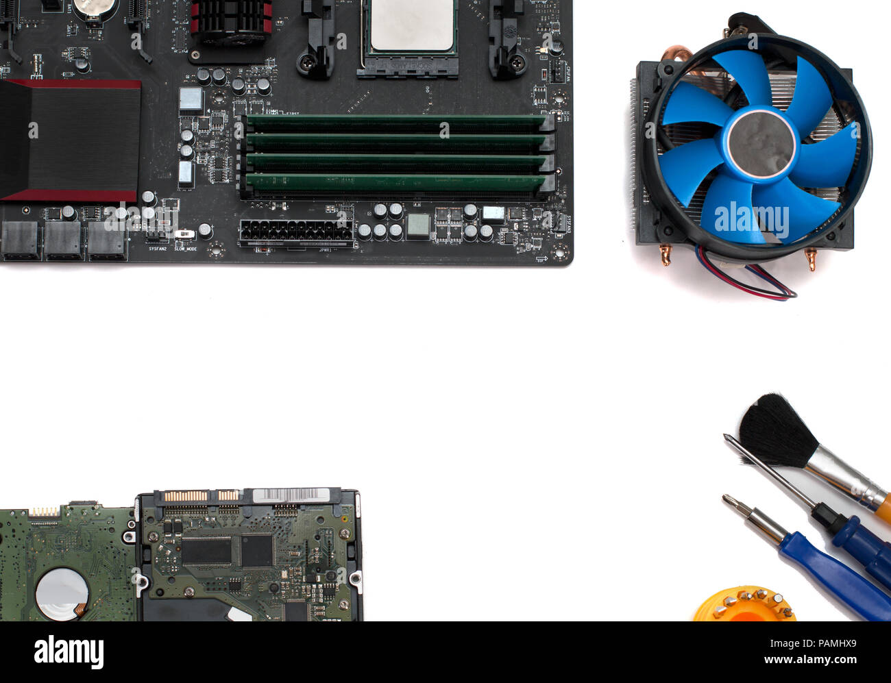 Computer assembly details and tools on a white background Stock Photo ...