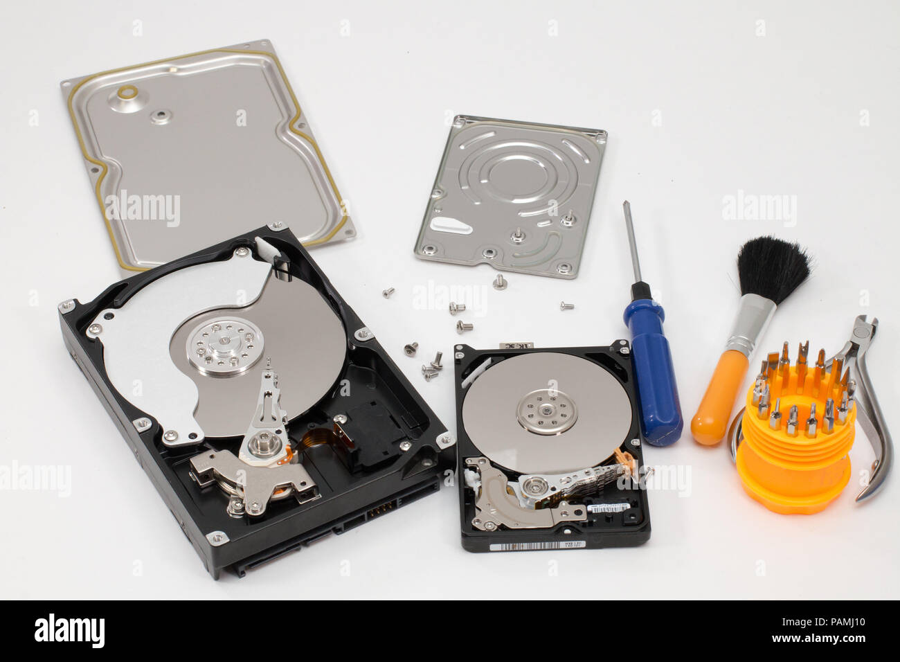 Process of disassembly of hard disks Stock Photo - Alamy