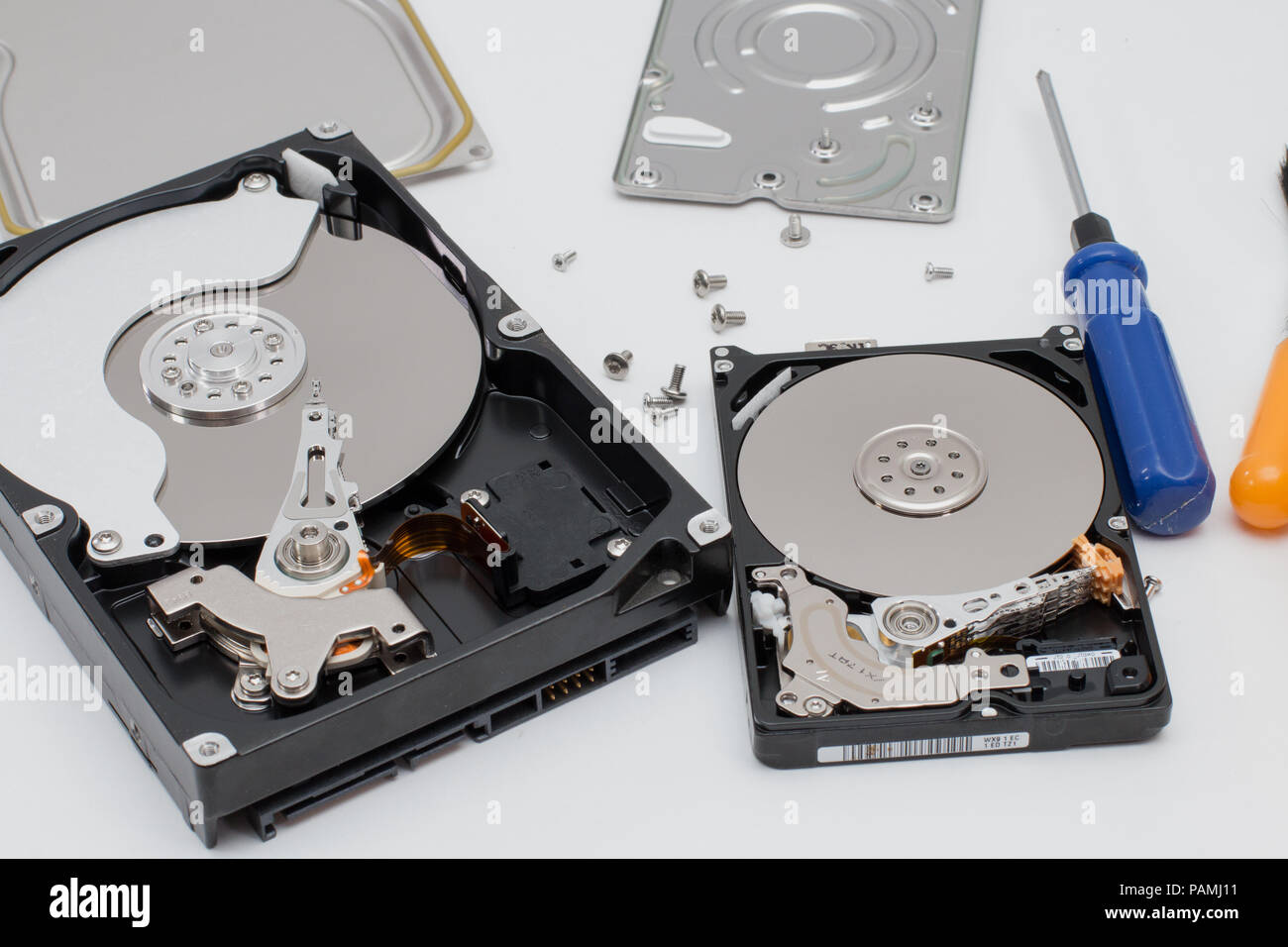 Process of disassembly of hard disks Stock Photo - Alamy