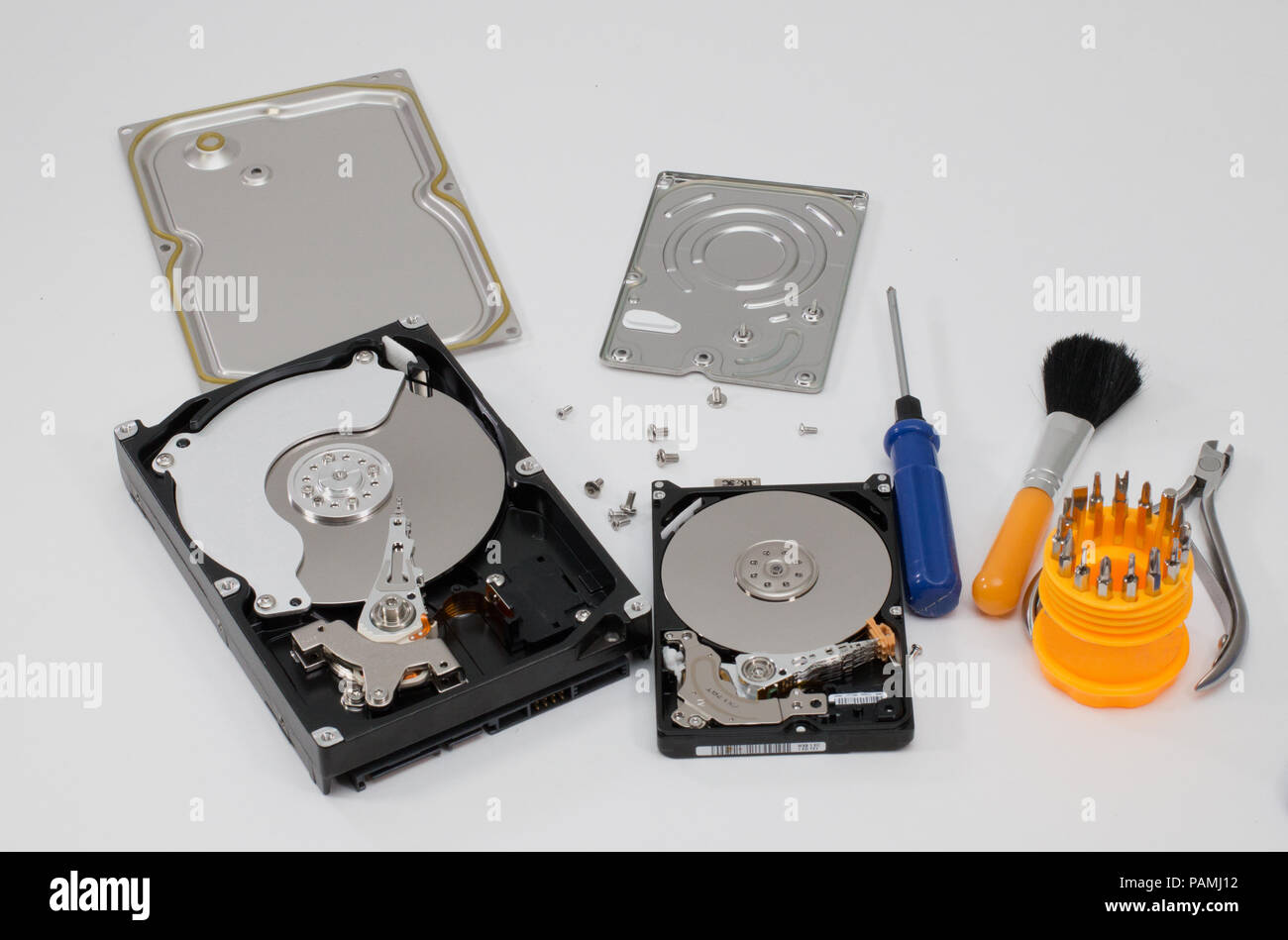 Process of disassembly of hard disks Stock Photo - Alamy