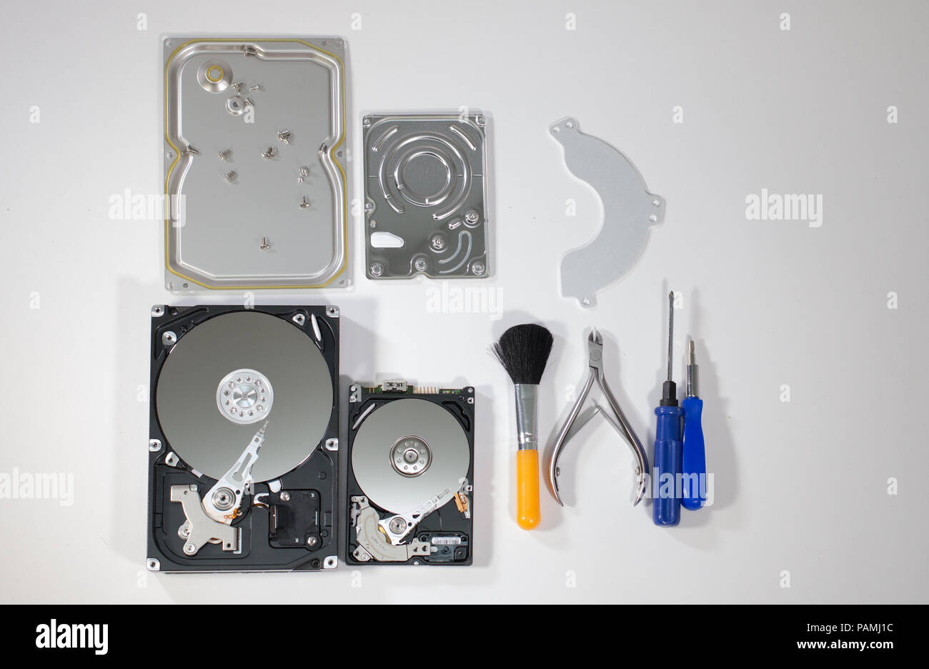 Process of disassembly of hard disks Stock Photo - Alamy