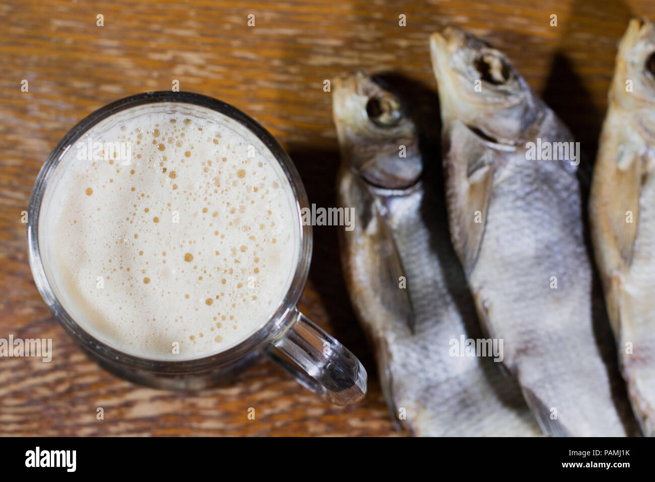 Russian snack . Beer and dried fish Stock Photo - Alamy