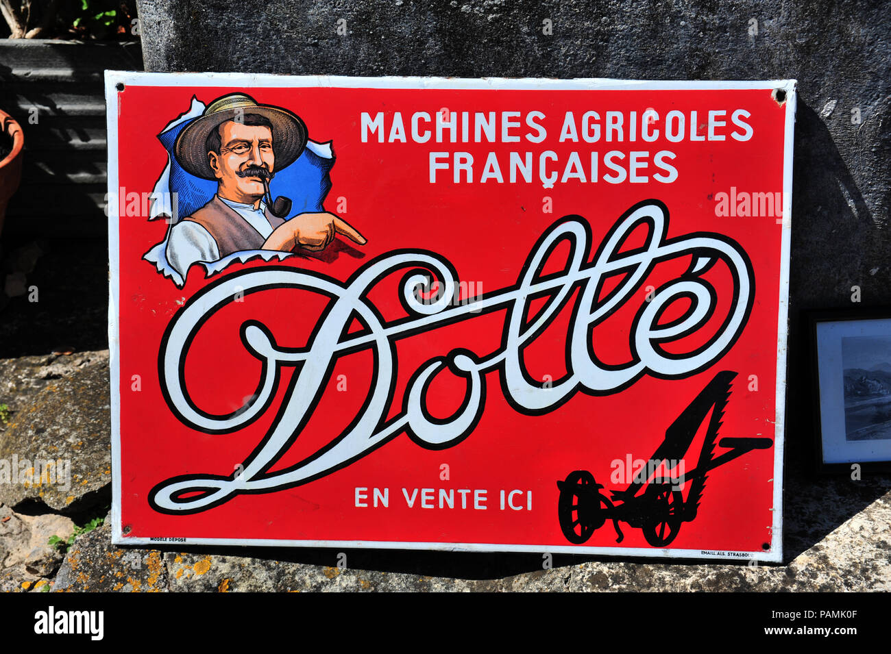 French metal advertising sign in french market Stock Photo - Alamy