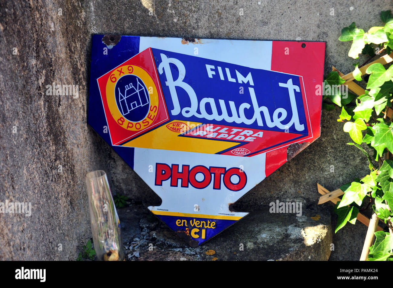 French metal advertising sign Stock Photo - Alamy